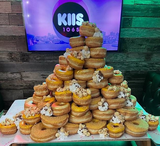 KYLE SANDILANDS ENJOYS A MOUNTAIN OF DR. DOUGH DONUTS – Dr. Dough
